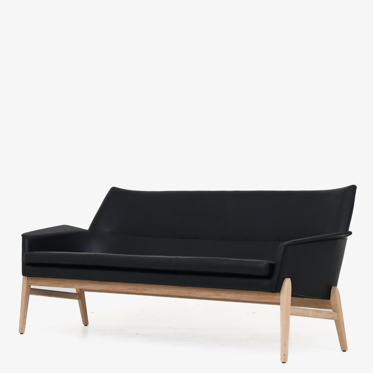 Ib Kofod-Larsen - 'Wing' sofa in black leather | EN.KLASSIK.DK - EST. 1991